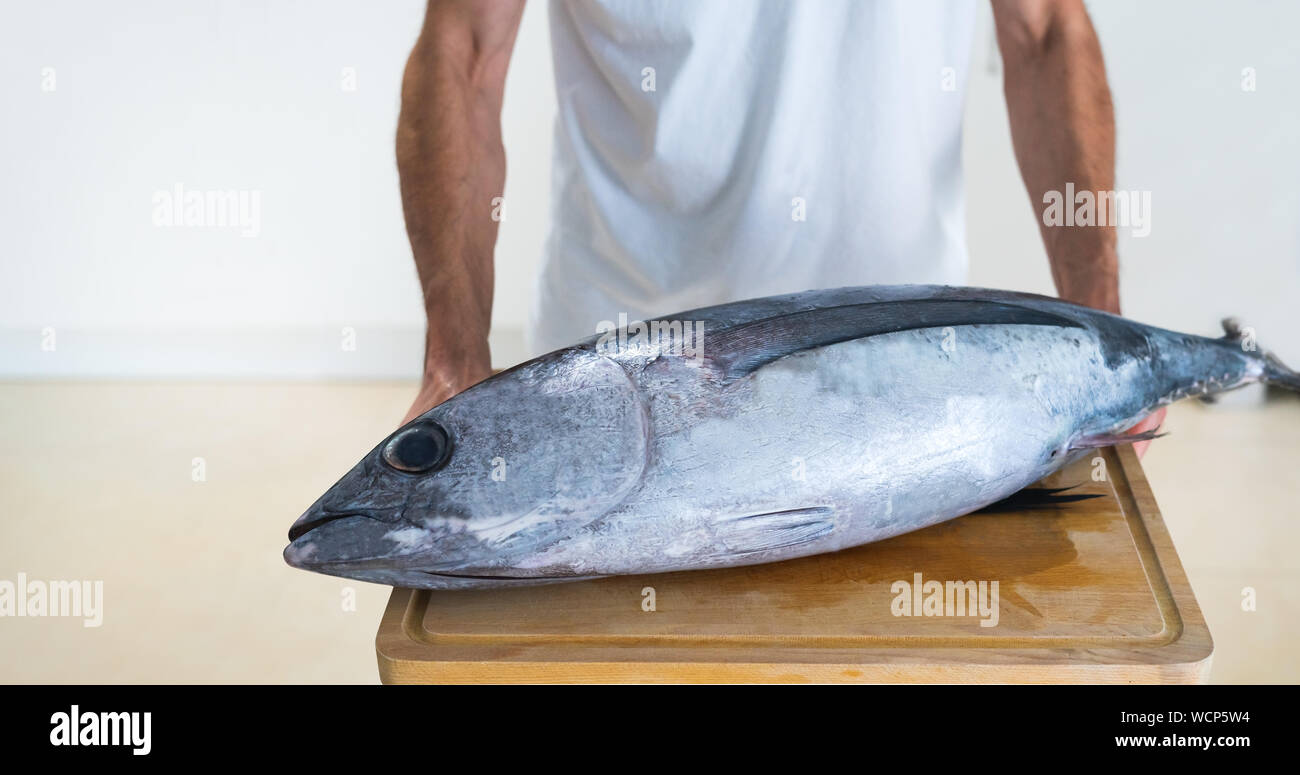 Fisherman carrying tuna hi-res stock photography and images - Alamy