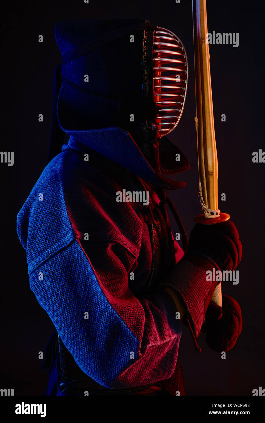 Close up shot, Kendo fighter wearing in an armor, traditional kimono ...