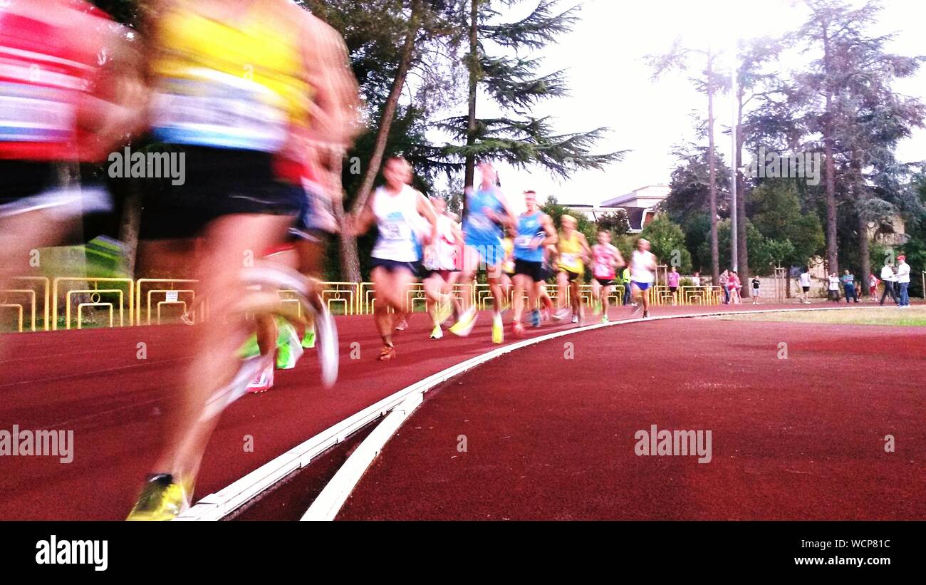 Group people running hi-res stock photography and images - Alamy