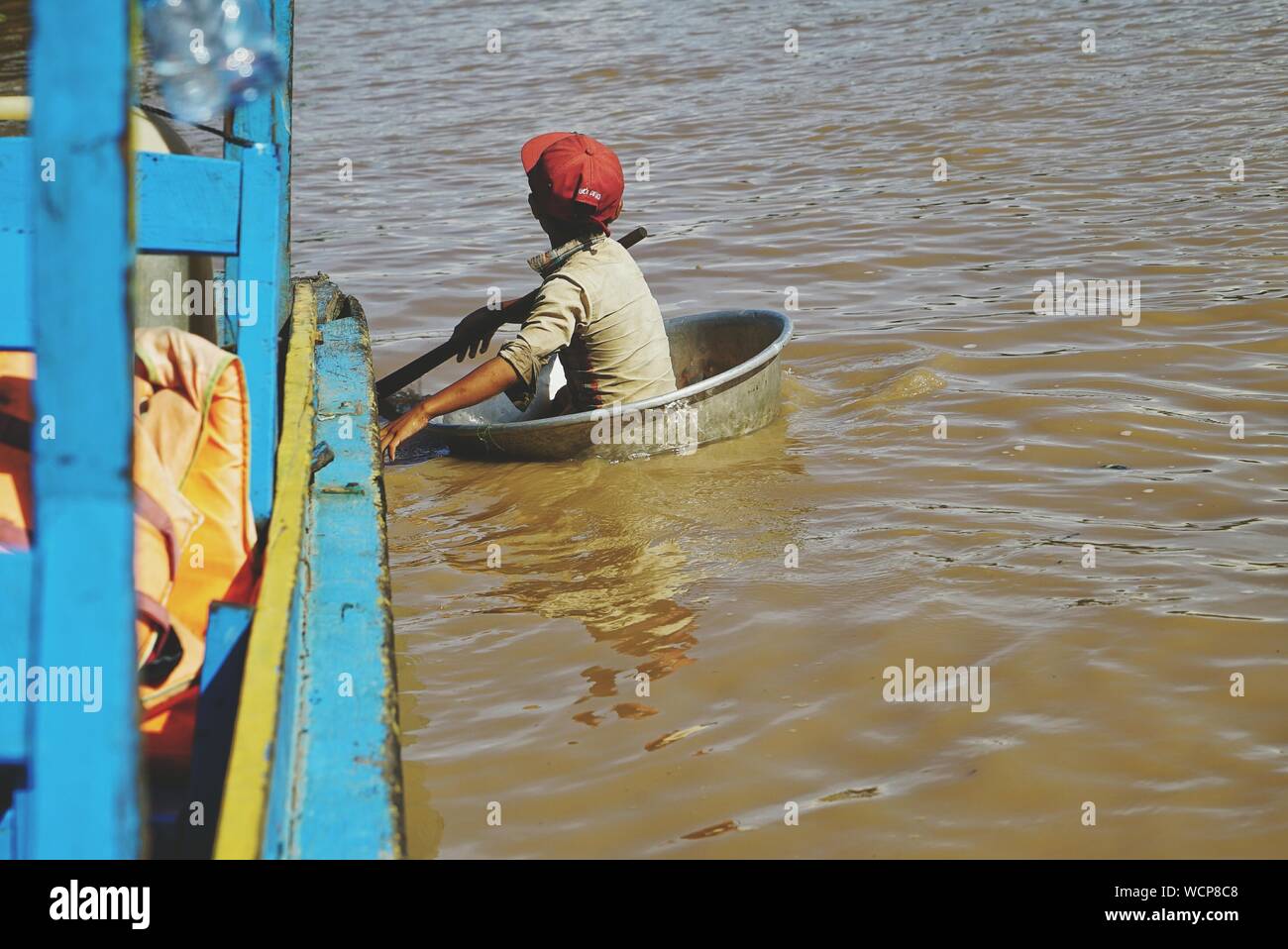 Container boat people hi-res stock photography and images - Alamy