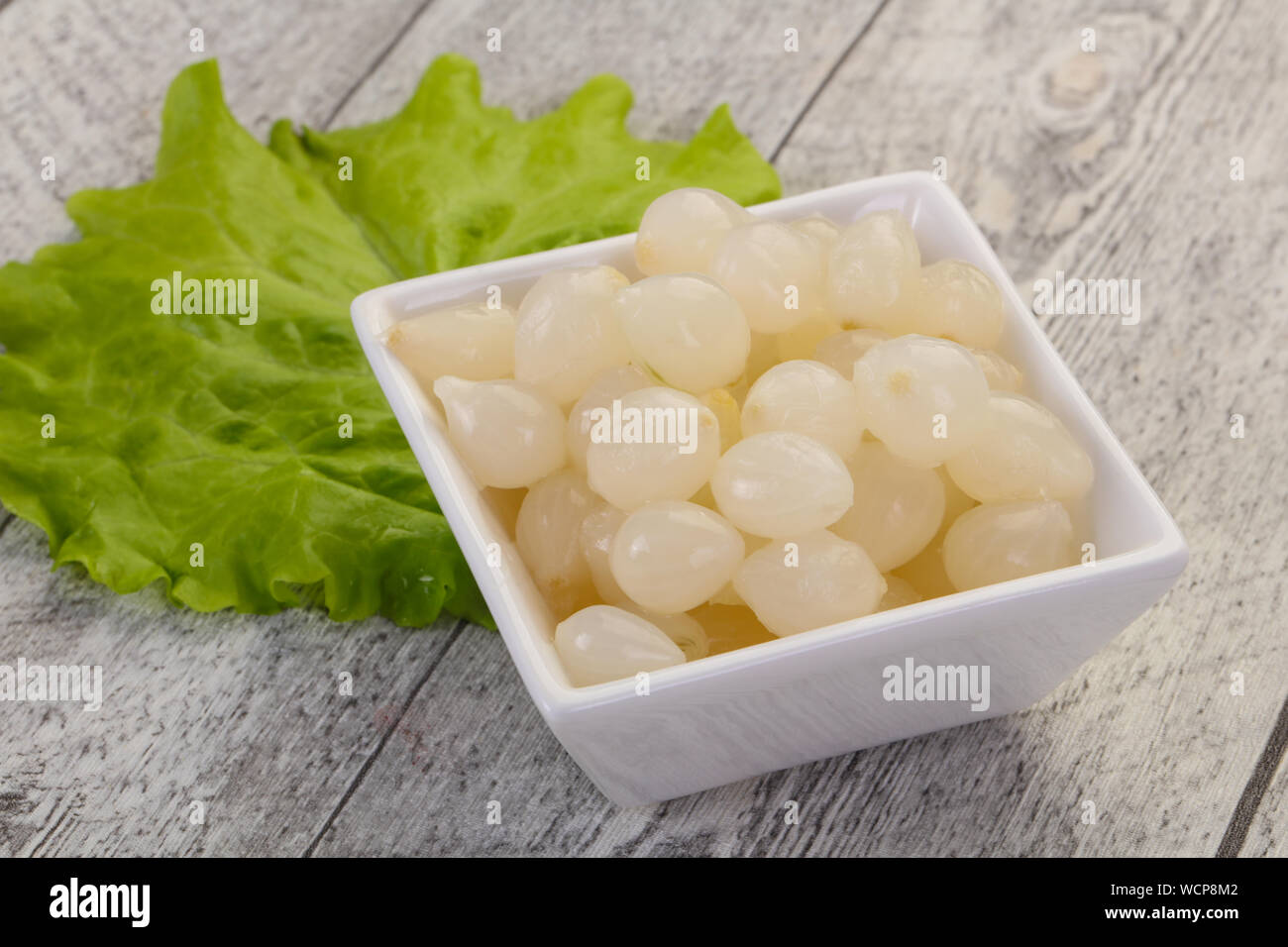 Pickled baby onion in the bowl Stock Photo - Alamy