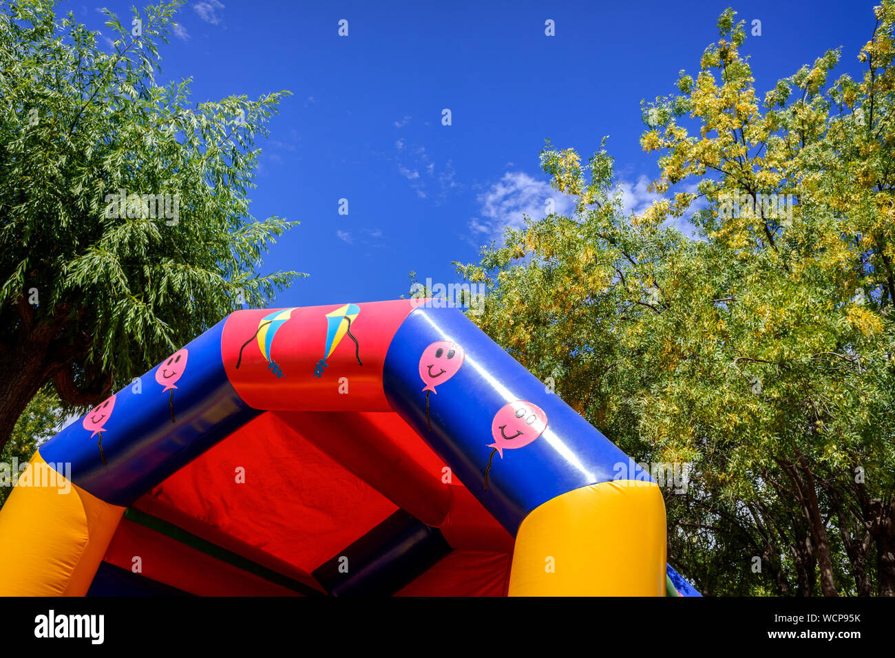 Inflatable castles with fun shapes Stock Photo - Alamy