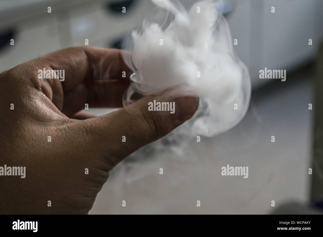 Hand Holding Smoke High Resolution Stock Photography and Images - Alamy