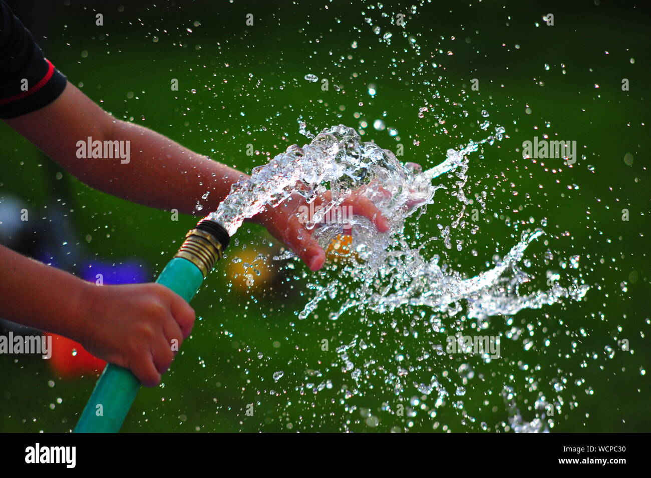 Hand holding water hi-res stock photography and images - Alamy