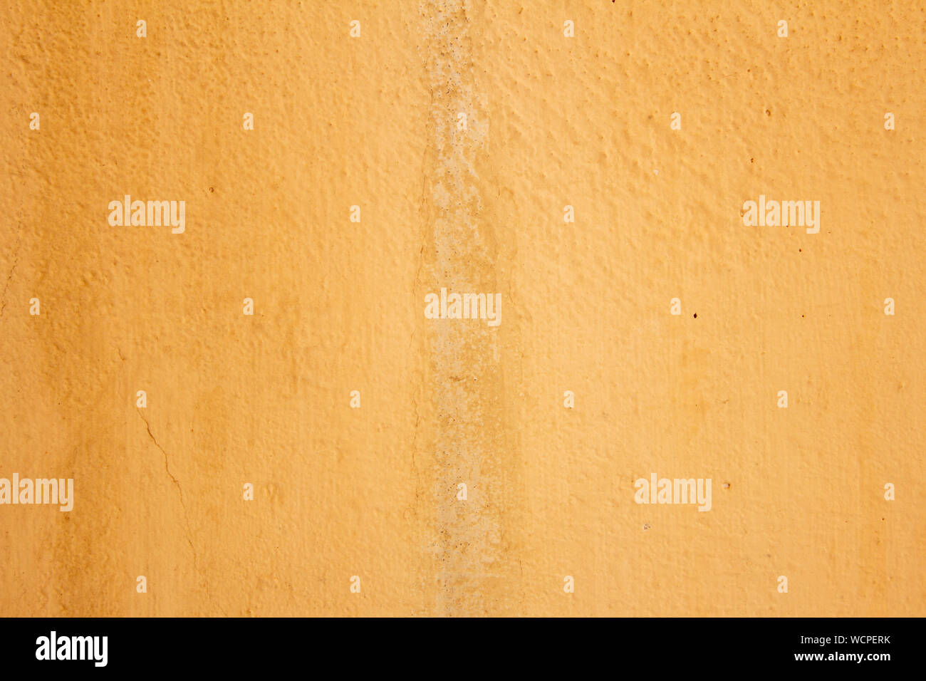 Faded Yellow Textured wall for background and design Stock Photo - Alamy