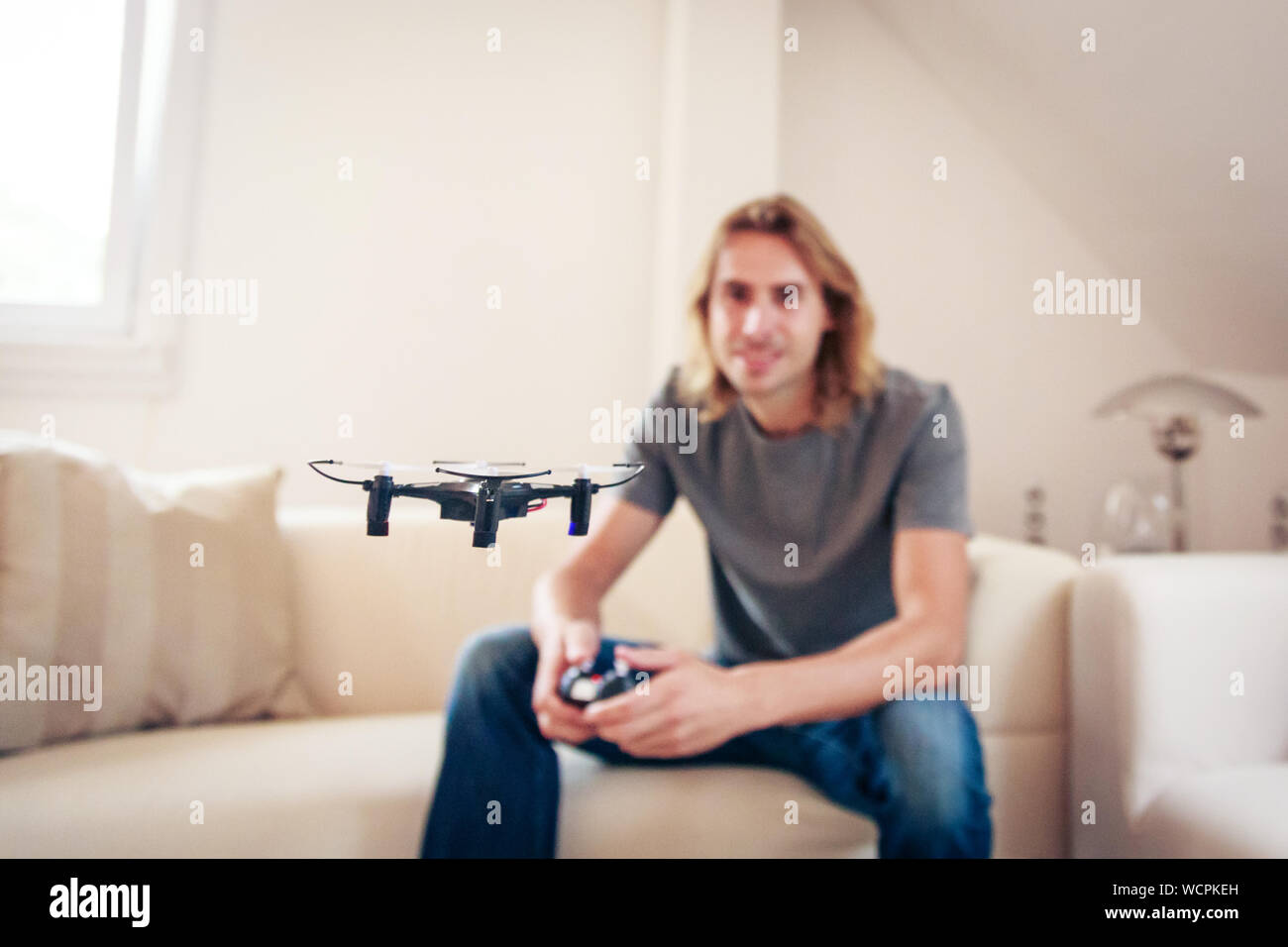 Person using a drone remote control hi-res stock photography and images ...