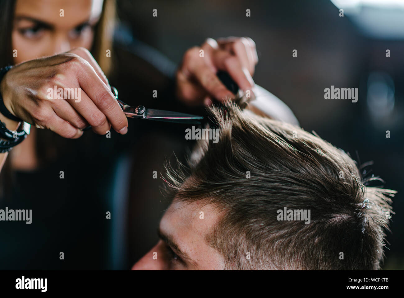Hairdresser Cutting Man Hair At Salon Stock Photo - Alamy