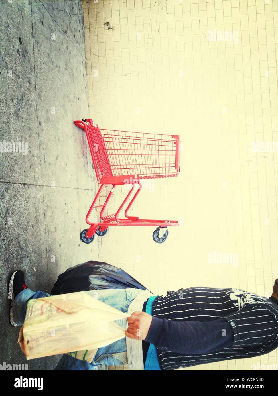 Person passing wall hi-res stock photography and images - Alamy