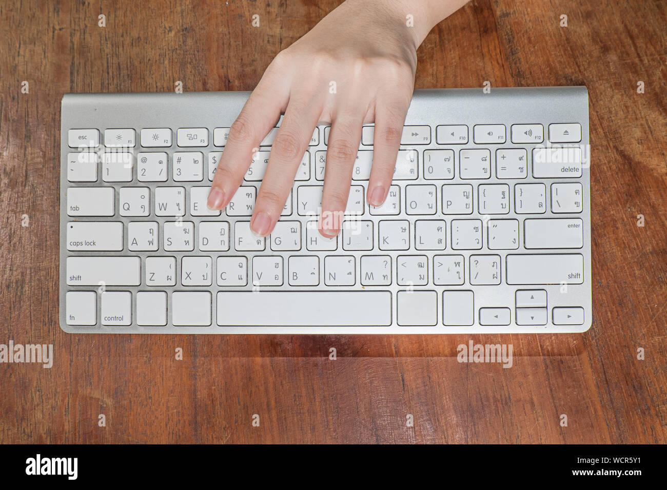 Hand above keyboard hi-res stock photography and images - Alamy