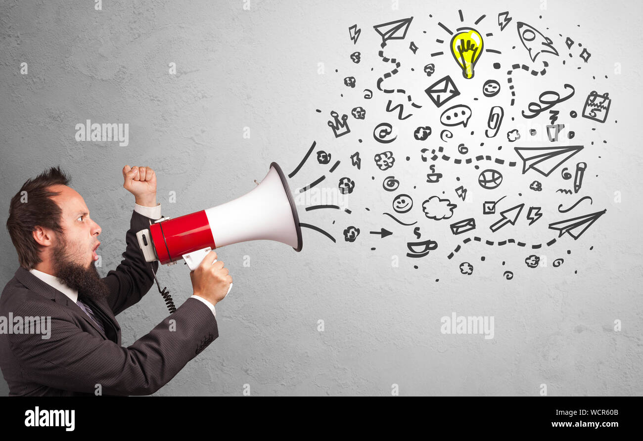 Person holding megaphone and yelling ideas concept Stock Photo - Alamy