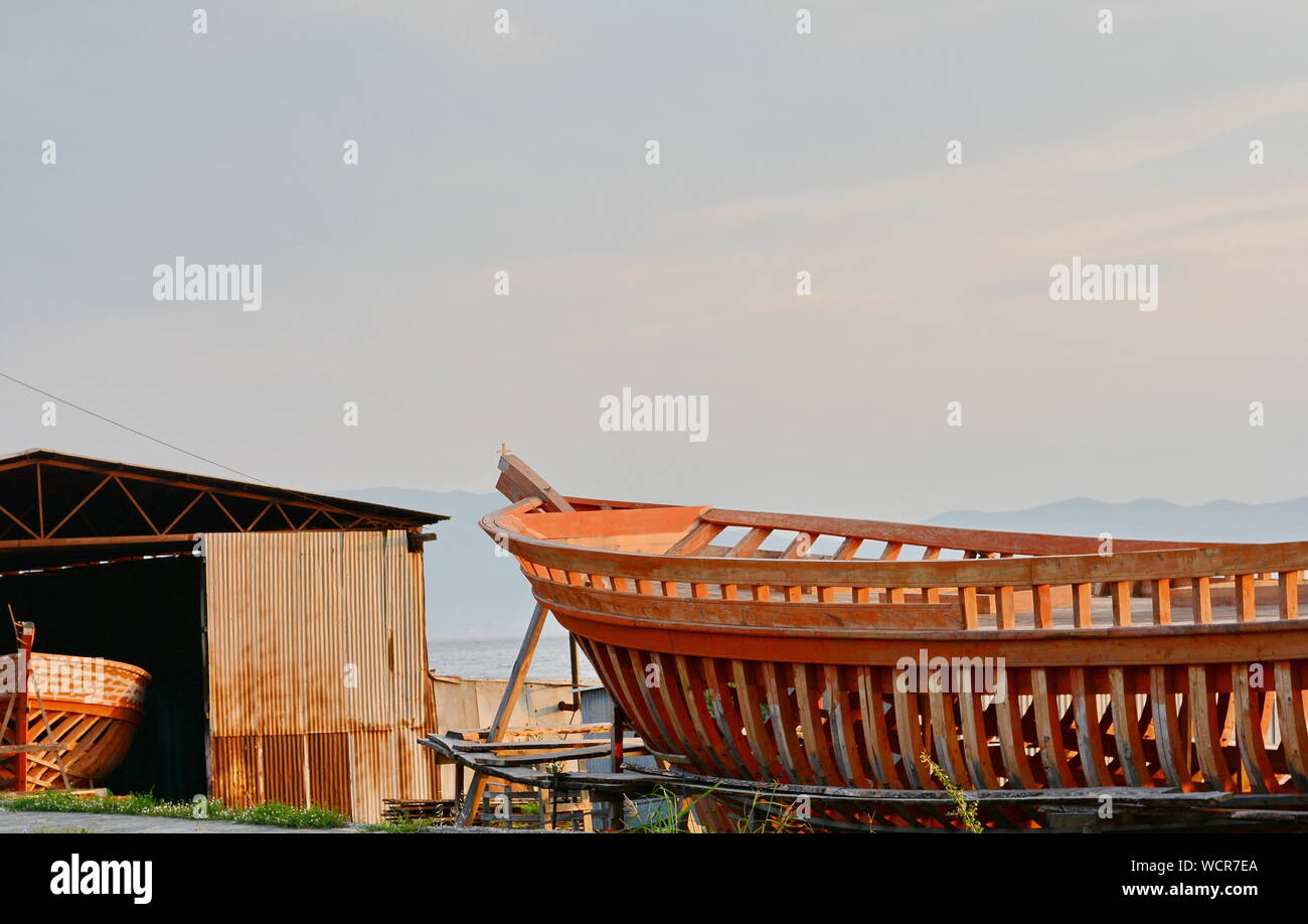 Construction of a ship in Ierissos, Greece. Little shipyard of wooden ...