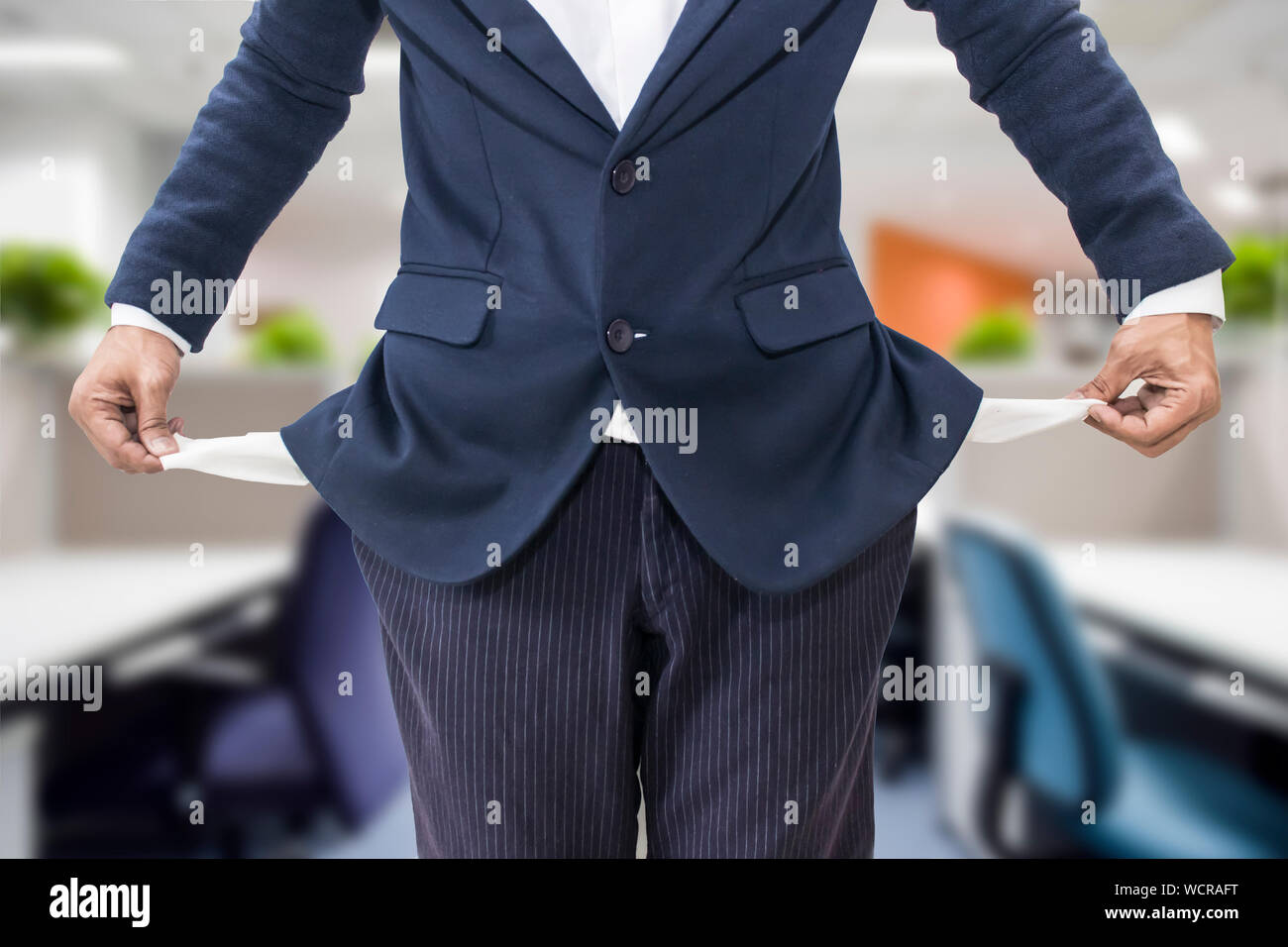Businessman showing his empty pocket hi-res stock photography and ...