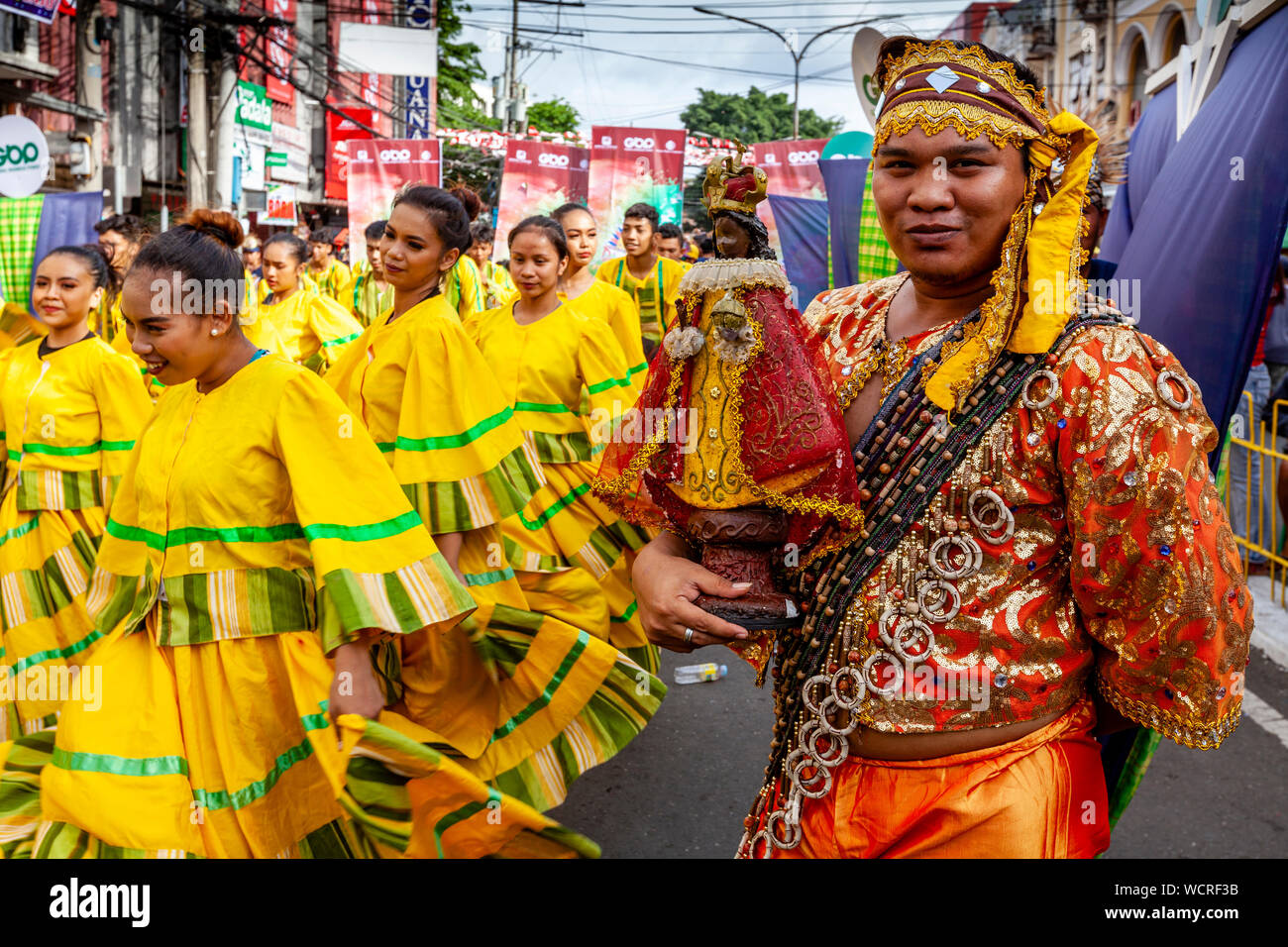 Local People Take Part In A Colourful Street Procession During The ...