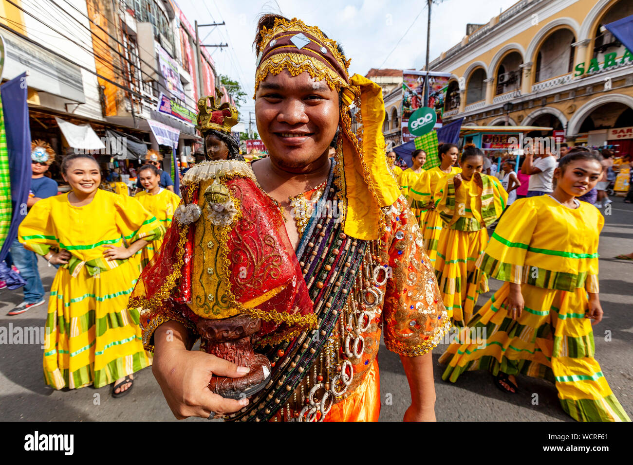 Local People Take Part In A Colourful Street Procession During The ...