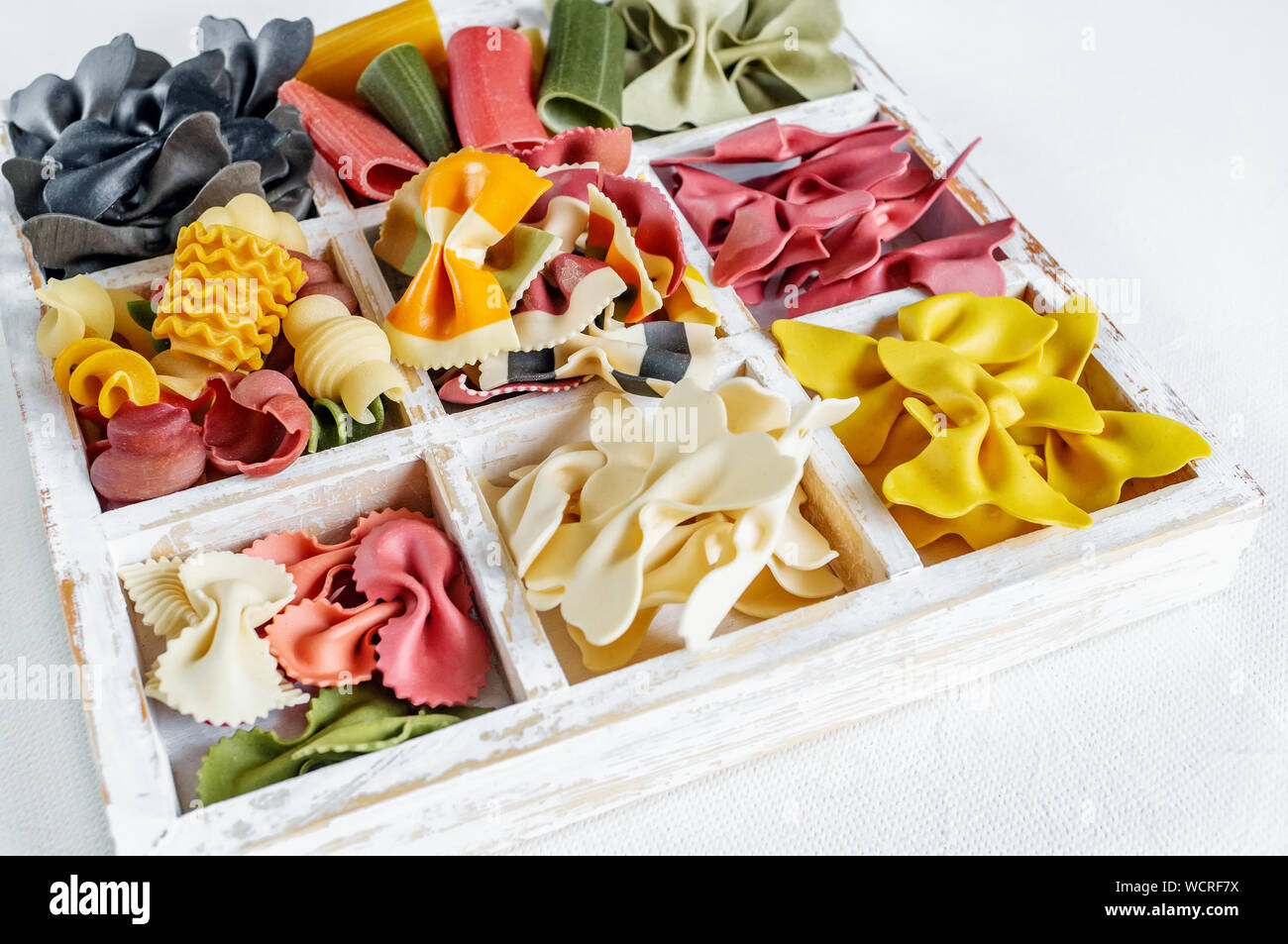 Italian pasta collection in wooden white box on light background Stock ...