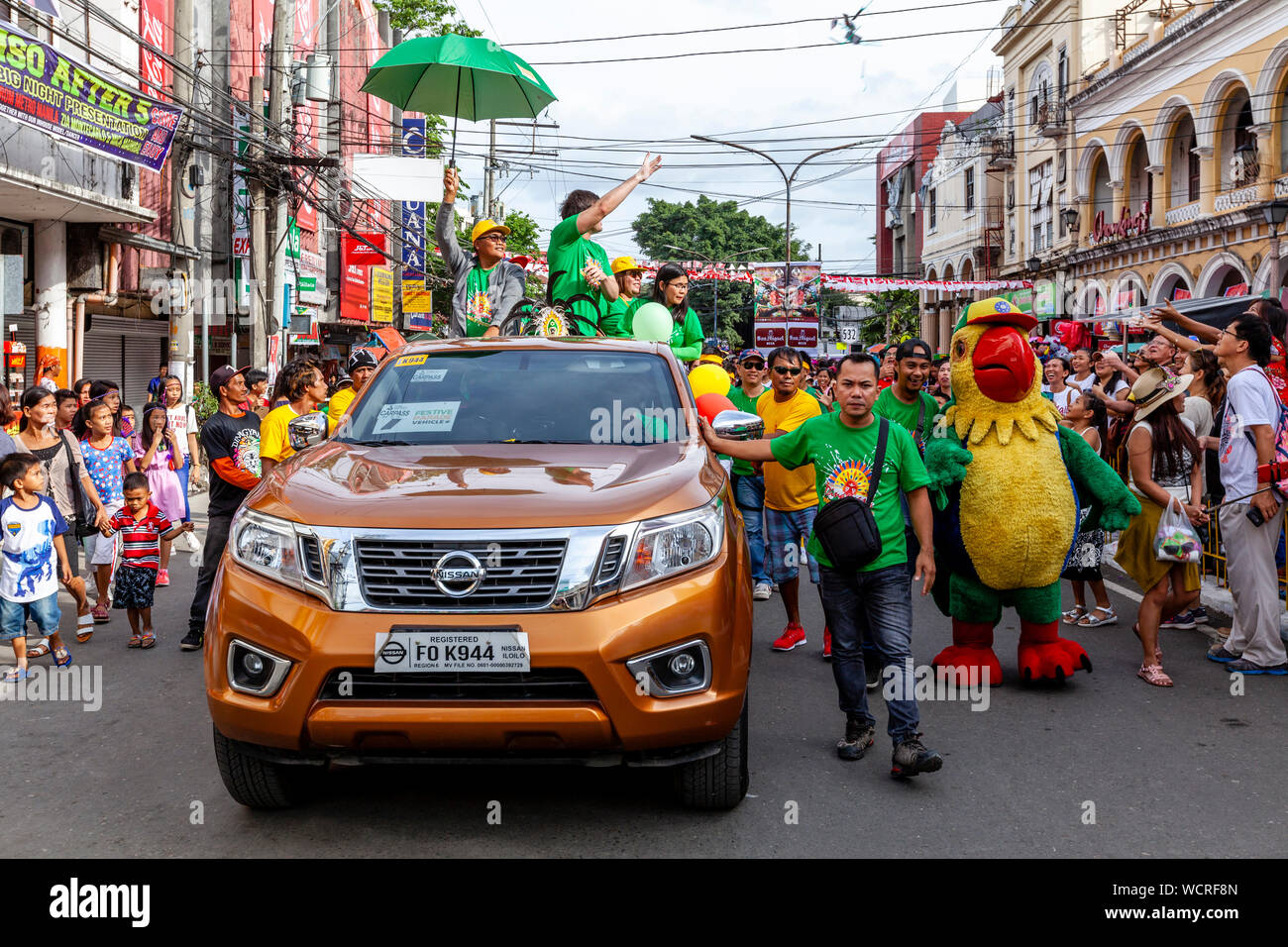 Sweets and Candy Are Thrown From A Car To The Watching Crowds During A ...