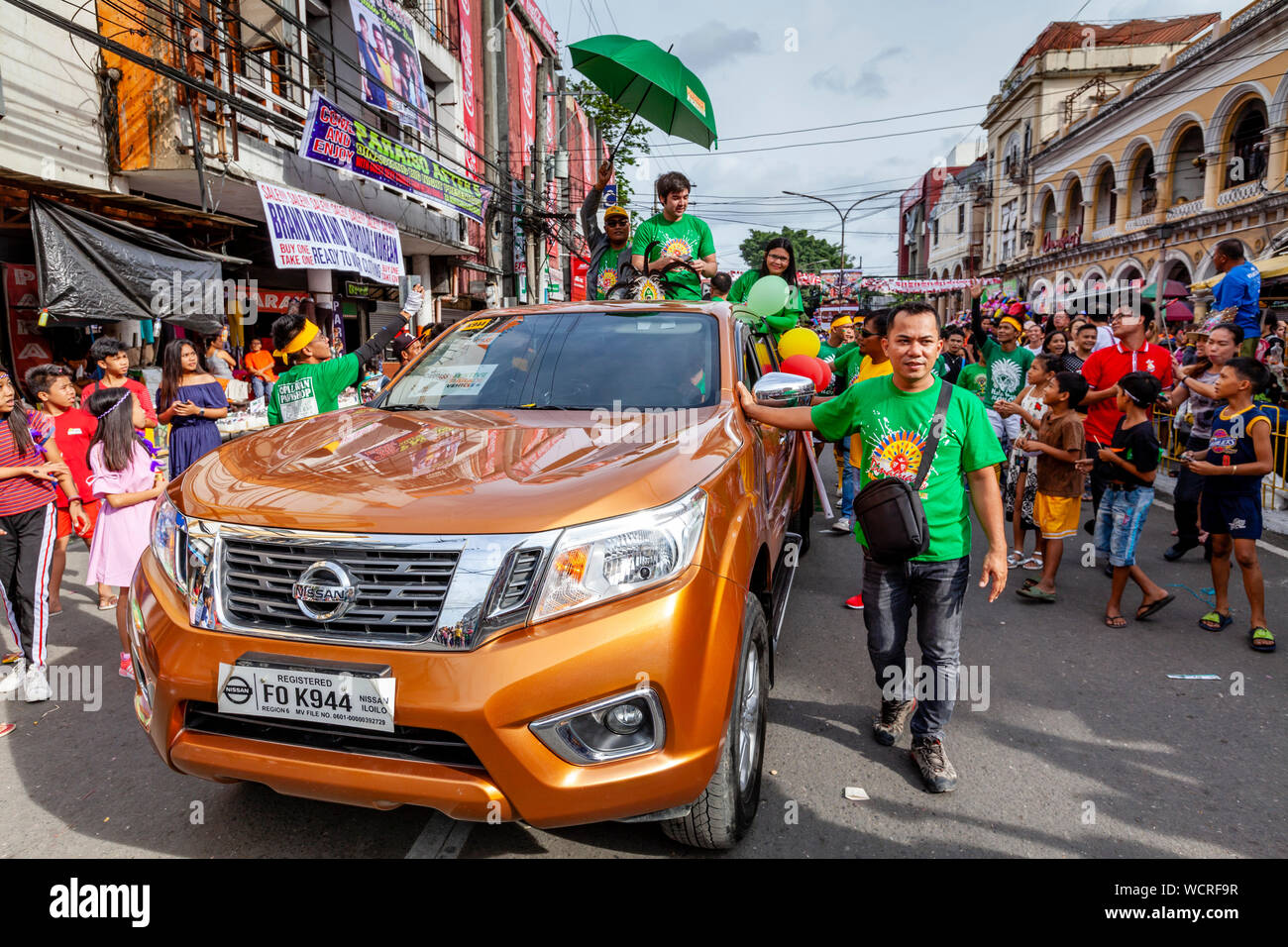 Sweets and Candy Are Thrown From A Car To The Watching Crowds During A ...