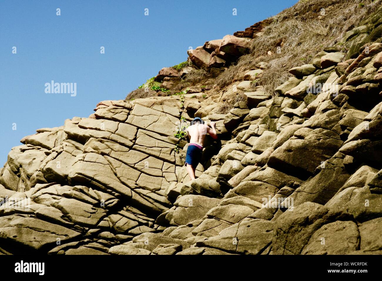 Three men climbing mountain hi-res stock photography and images - Alamy