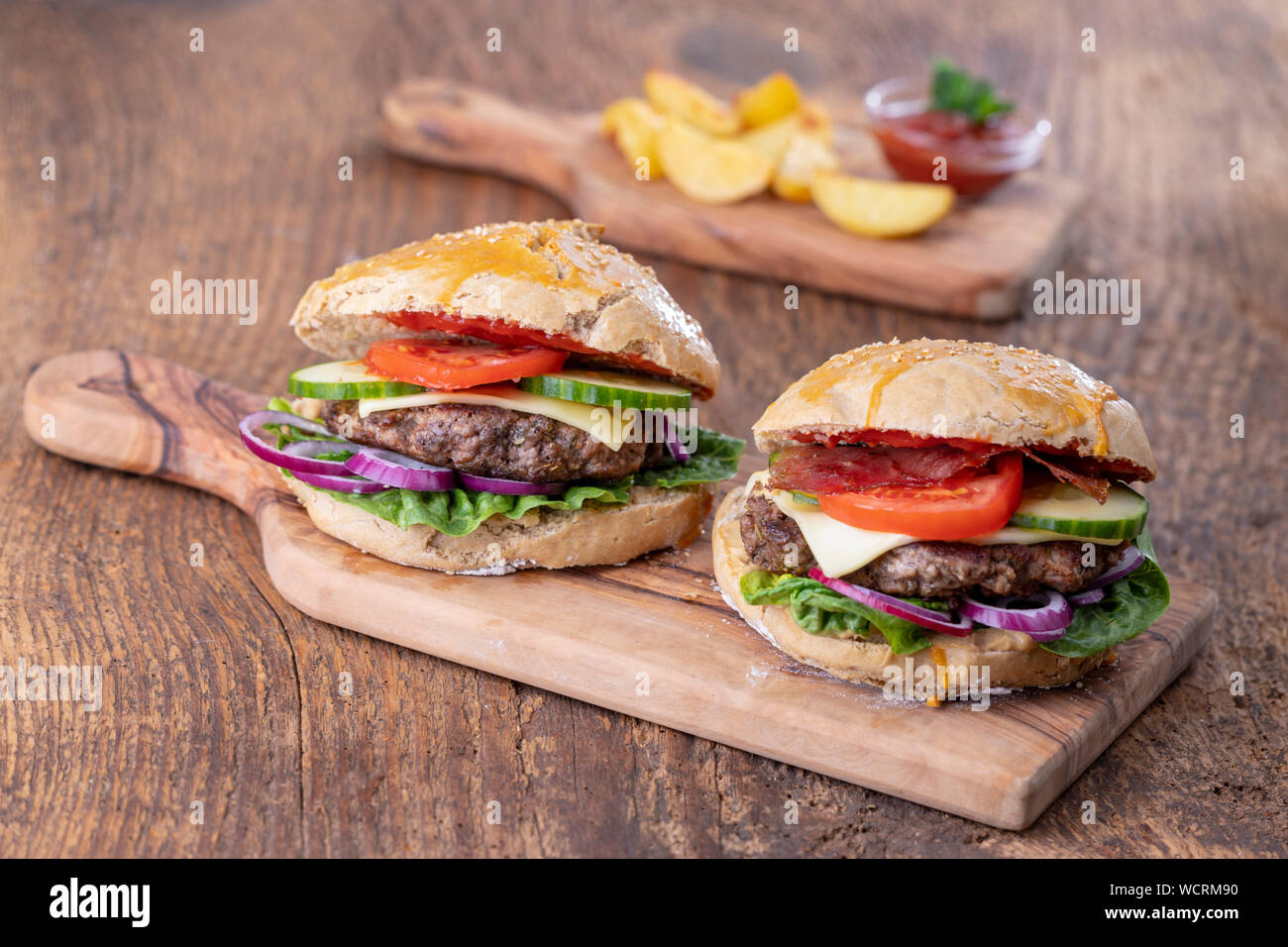 Home made burger on dark wood hi-res stock photography and images - Alamy
