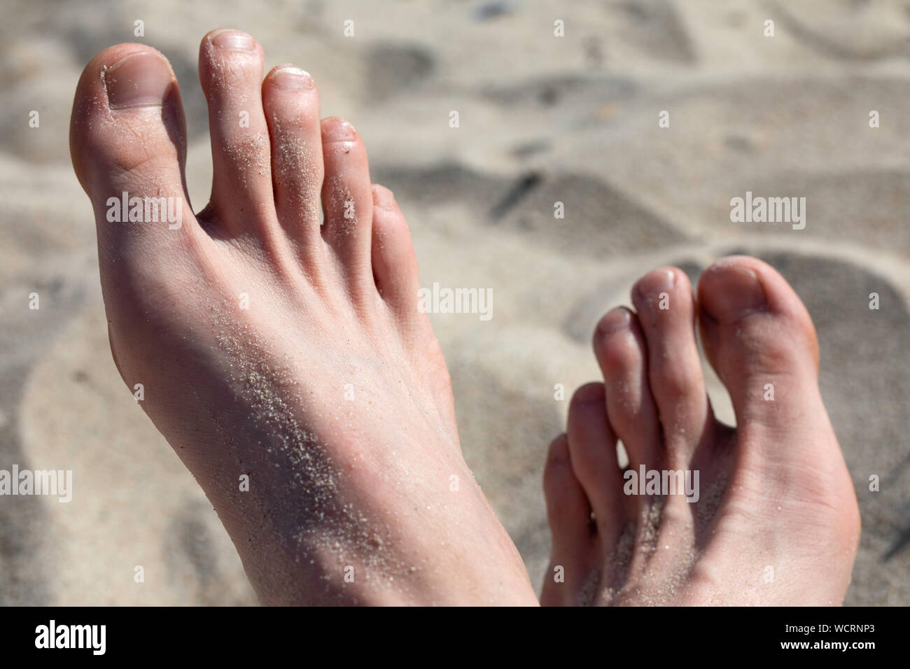 Feet on the fine sand. Baltic Sea shore, Island Rugen Stock Photo - Alamy