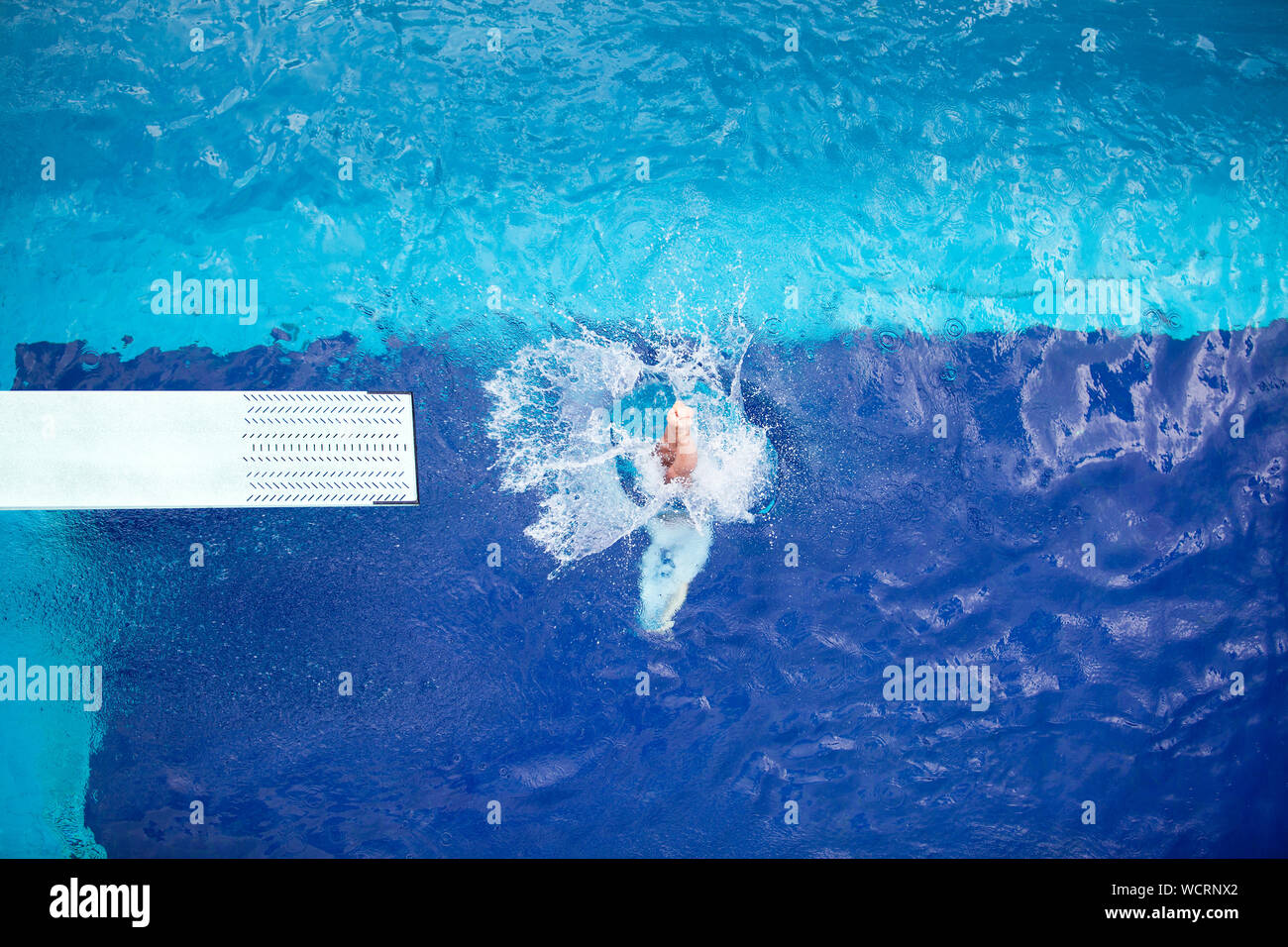 Women swimming pool diving hi-res stock photography and images - Alamy