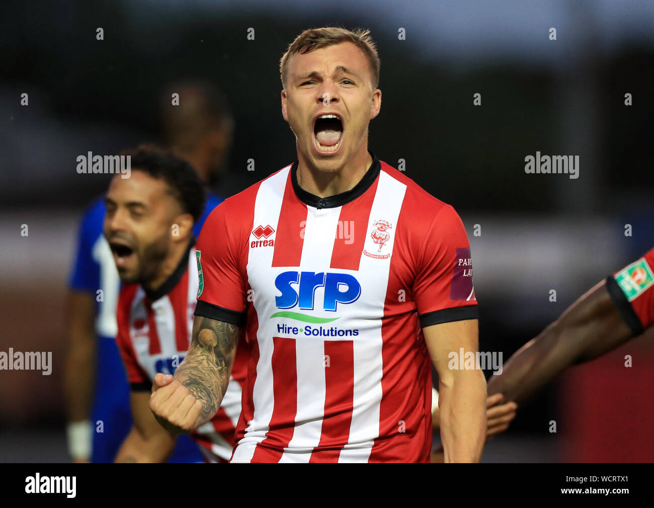 Lincoln citys harry anderson celebrates scoring hi-res stock ...