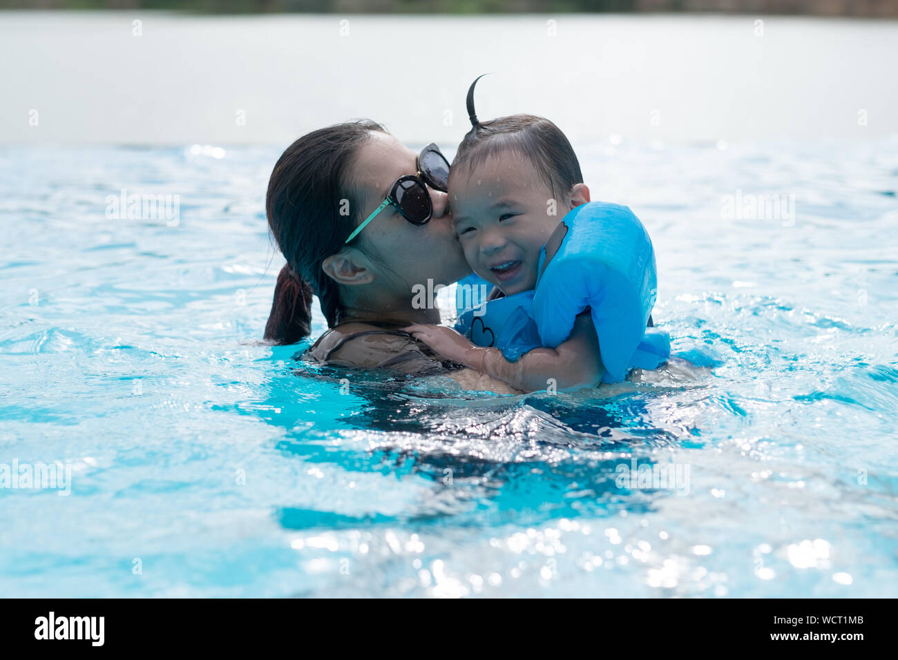 Daughter mother in swimming pool hi-res stock photography and images ...