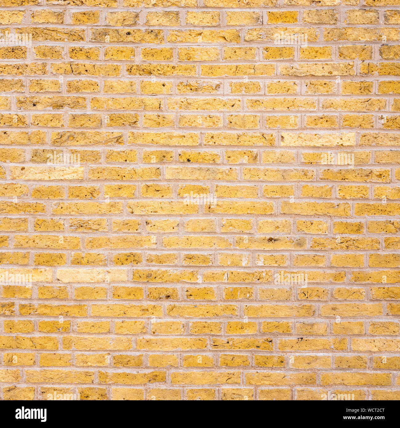 Gold brick wall hi-res stock photography and images - Alamy