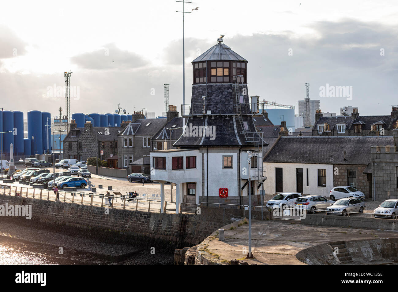 Ferry leaving the port with the Roundhouse, Pocra Quay at right ...