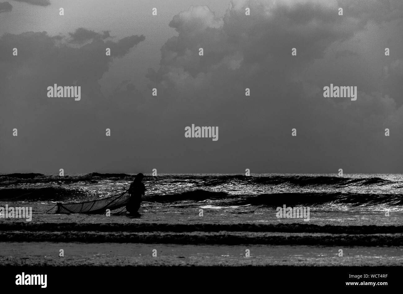Fisherman at Work Stock Photo - Alamy