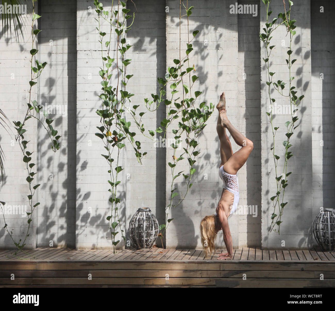 Wall handstand hi-res stock photography and images - Alamy