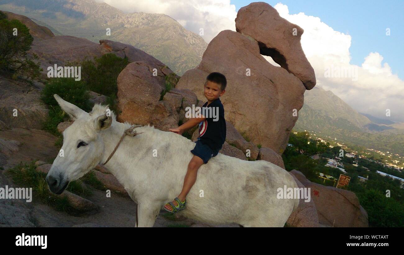 Boy Riding Donkey High Resolution Stock Photography and Images - Alamy