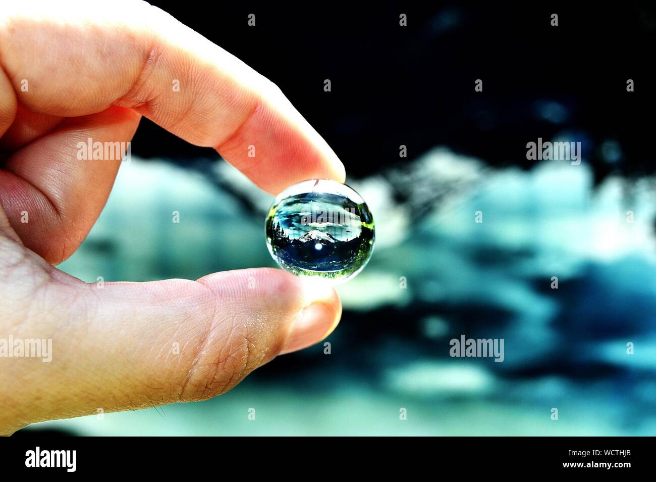 Hand Holding Marbles High Resolution Stock Photography and Images - Alamy