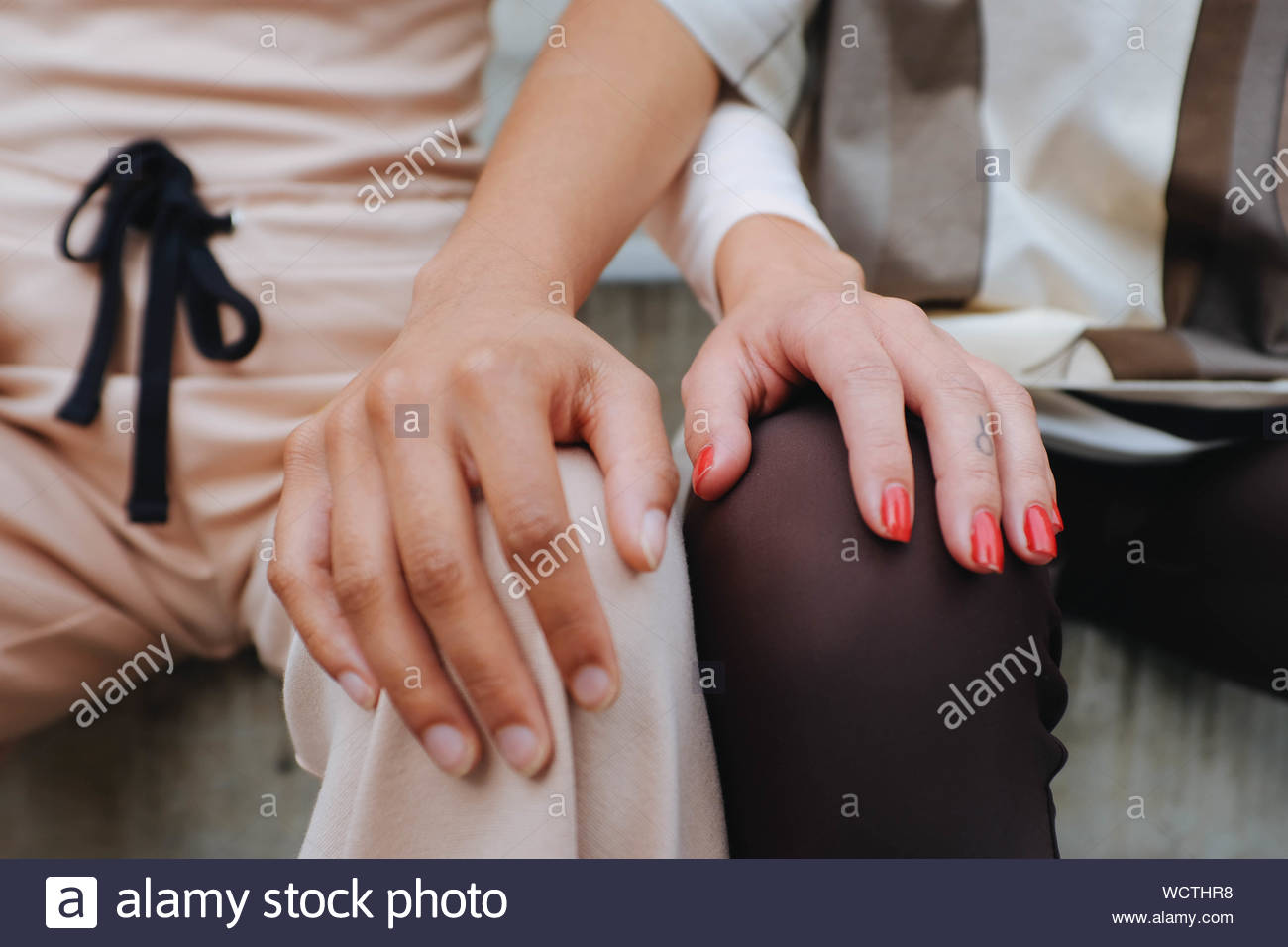 Human Hands On Knee Stock Photos & Human Hands On Knee Stock Images - Alamy