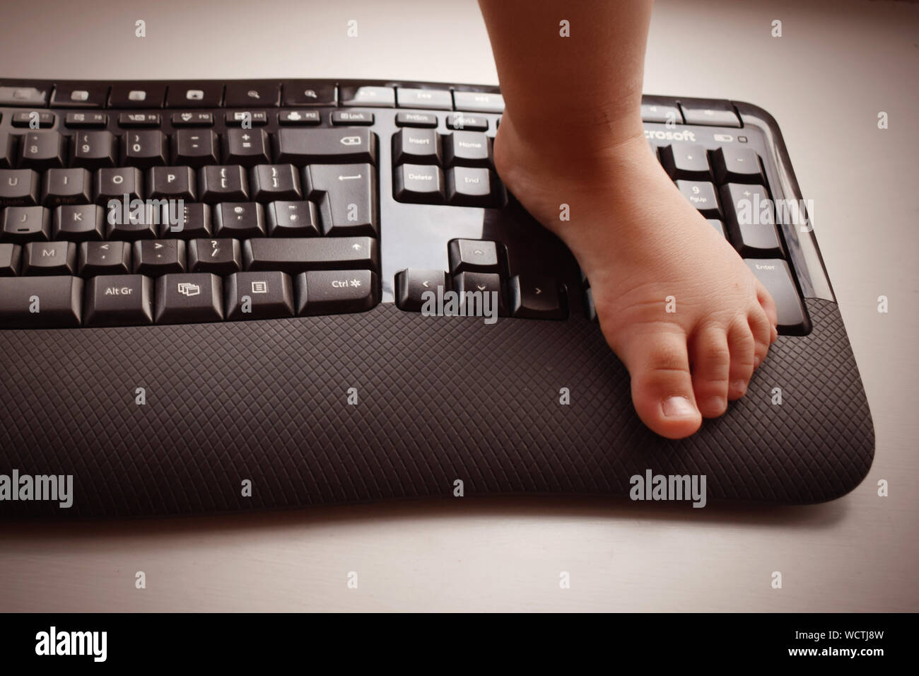 Baby at the computer hi-res stock photography and images - Alamy