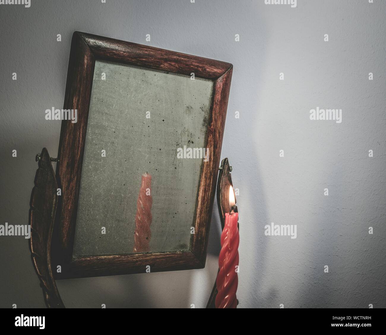 Candle reflecting hi-res stock photography and images - Alamy