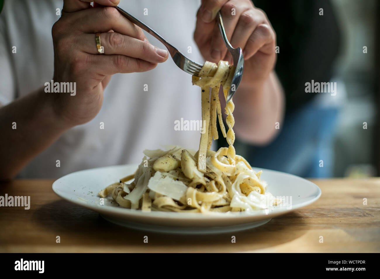 Close up man eating pasta hi-res stock photography and images - Alamy