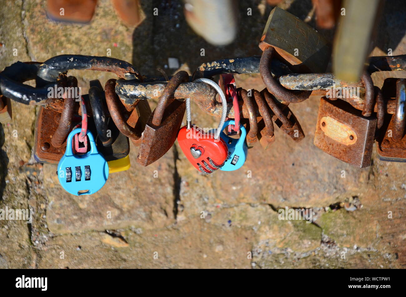 Love locks fastened to chain at Royal Albert Dock, Liverpool, England ...