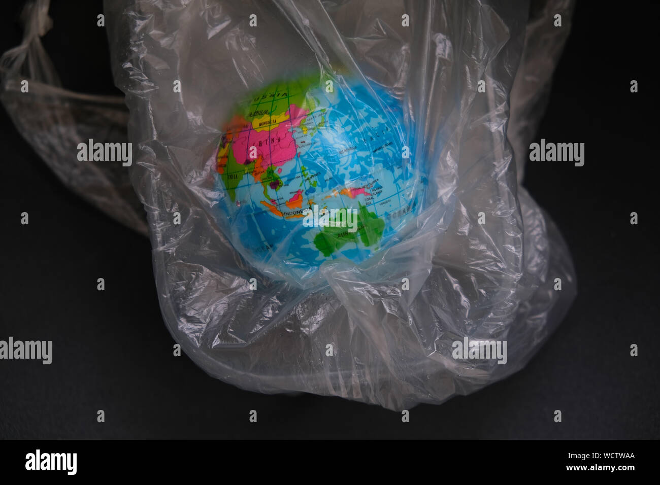 The globe covered in plastic Stock Photo - Alamy