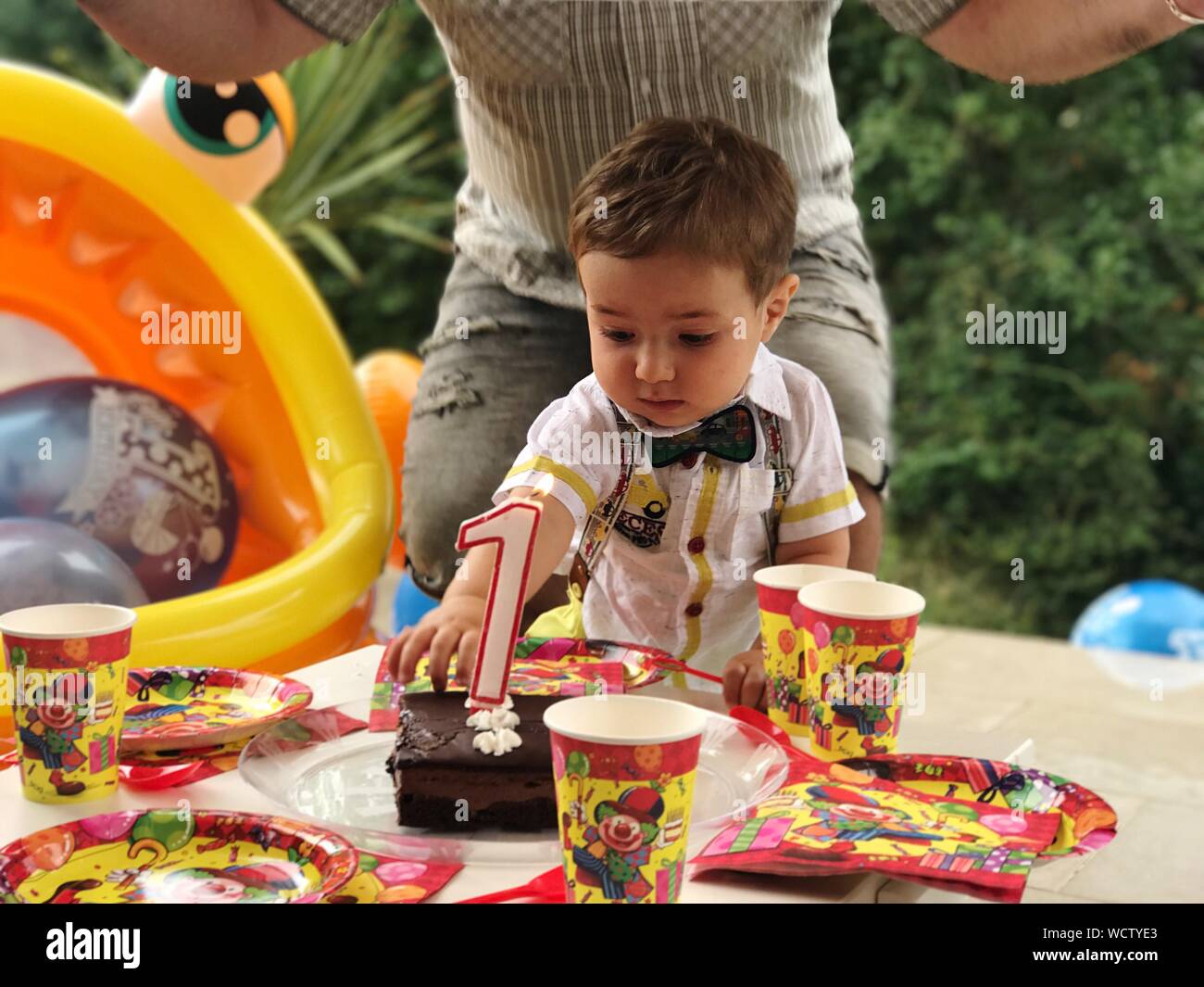 Boy with cake hi-res stock photography and images - Alamy
