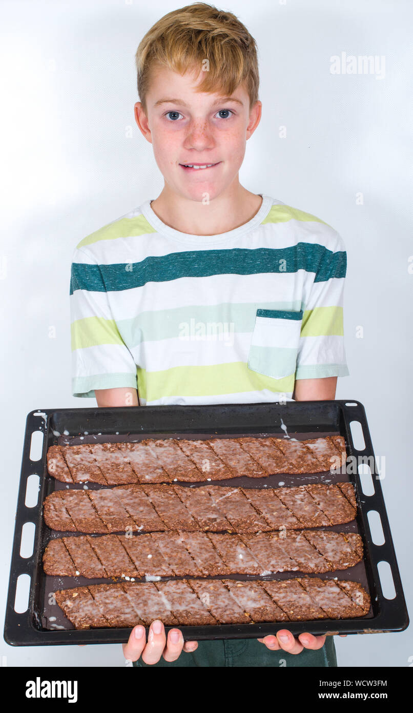 Boy holding food bowl hi-res stock photography and images - Alamy