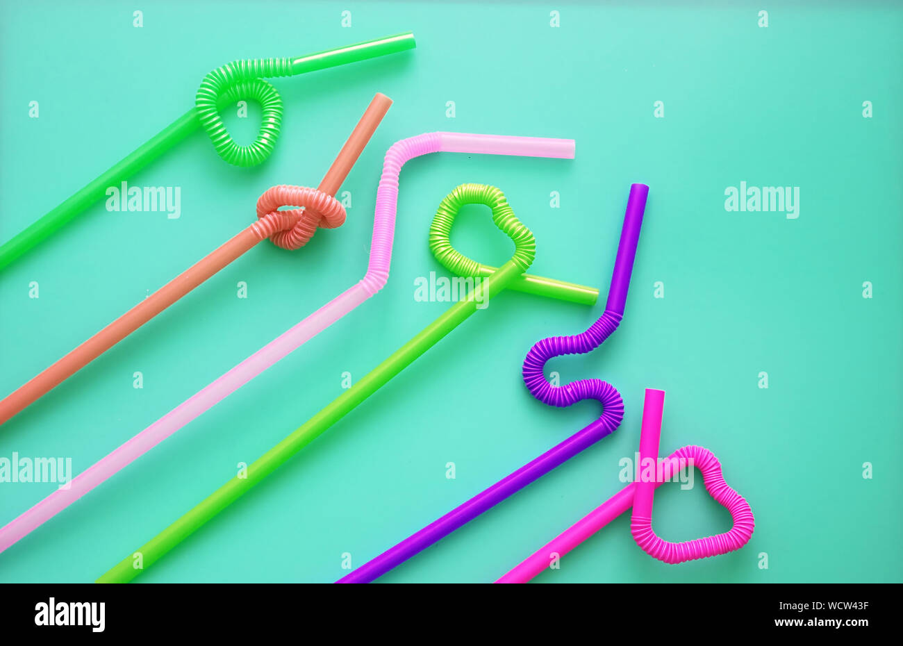 Twisted neon blue party straw hi-res stock photography and images - Alamy