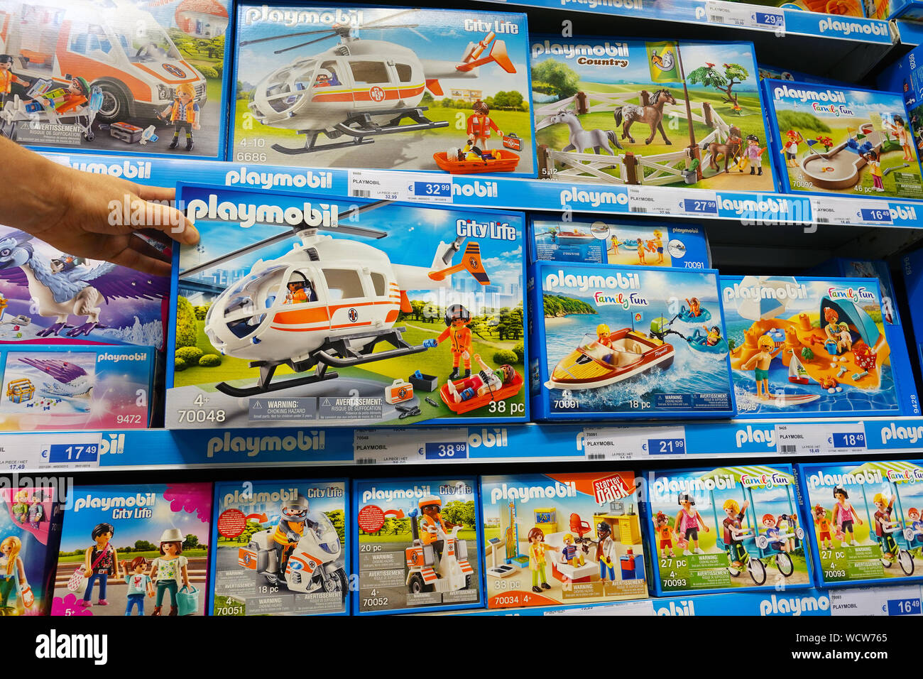 Playmobil toys stacked on a shelf in a toy store Stock Photo - Alamy