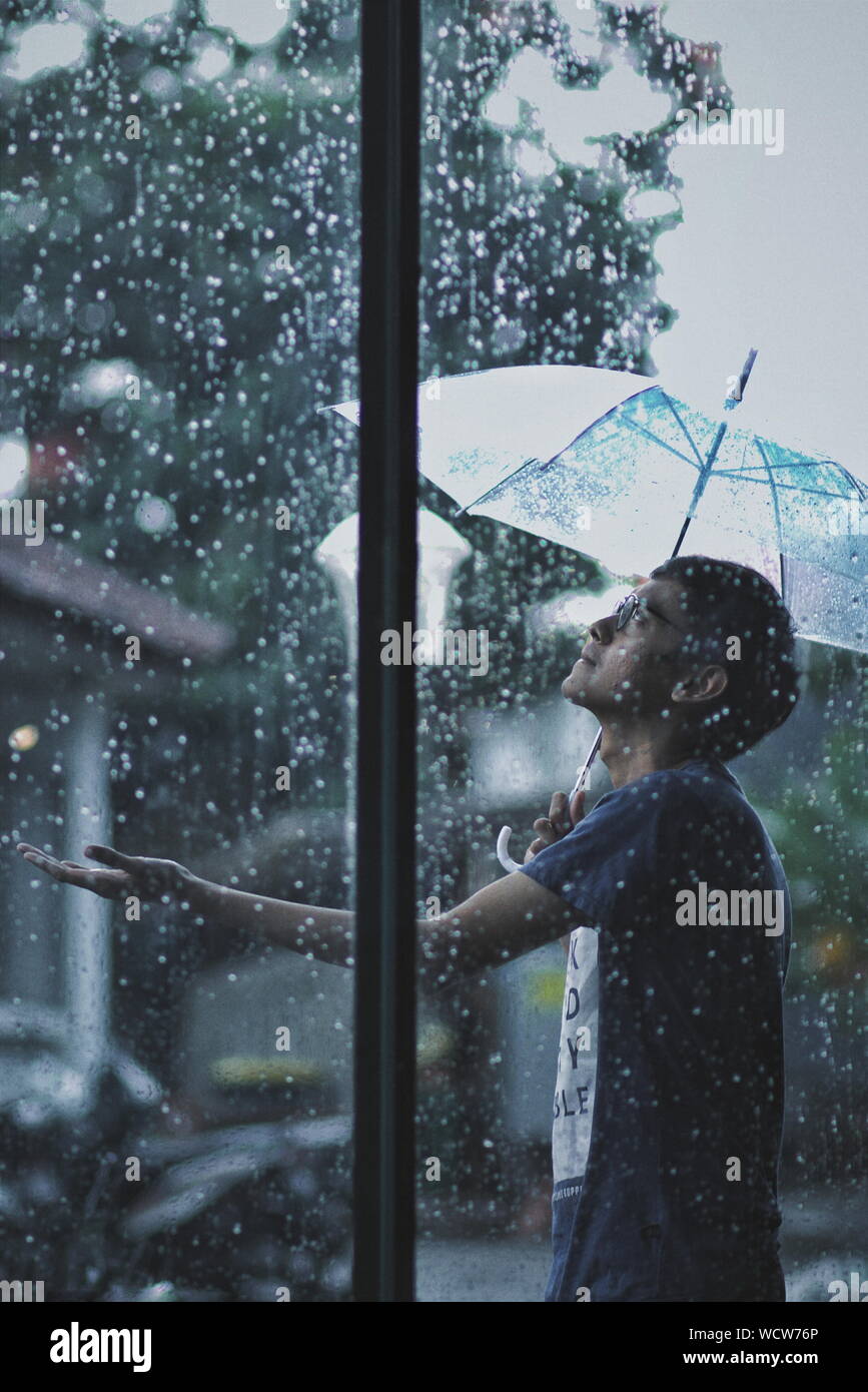 Man rain window hi-res stock photography and images - Alamy
