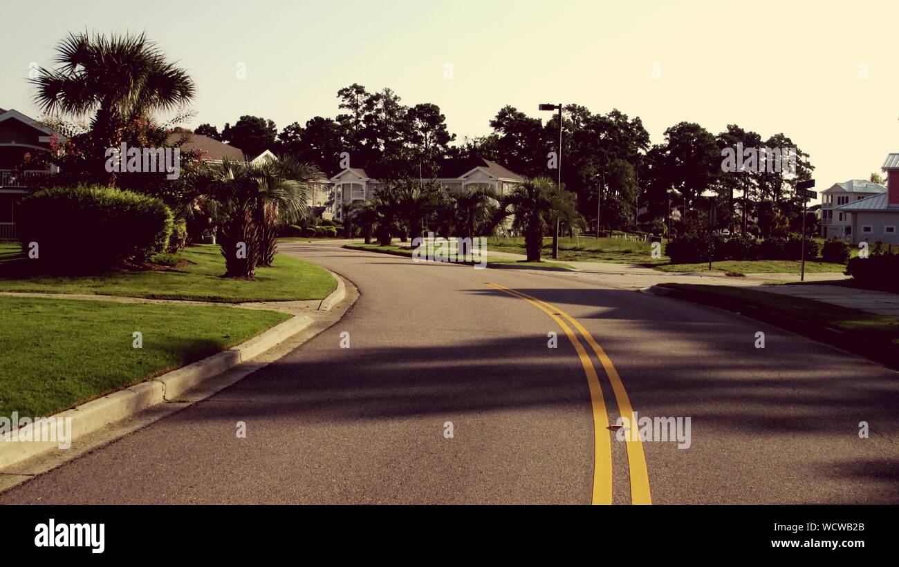 Empty residential street hi-res stock photography and images - Alamy