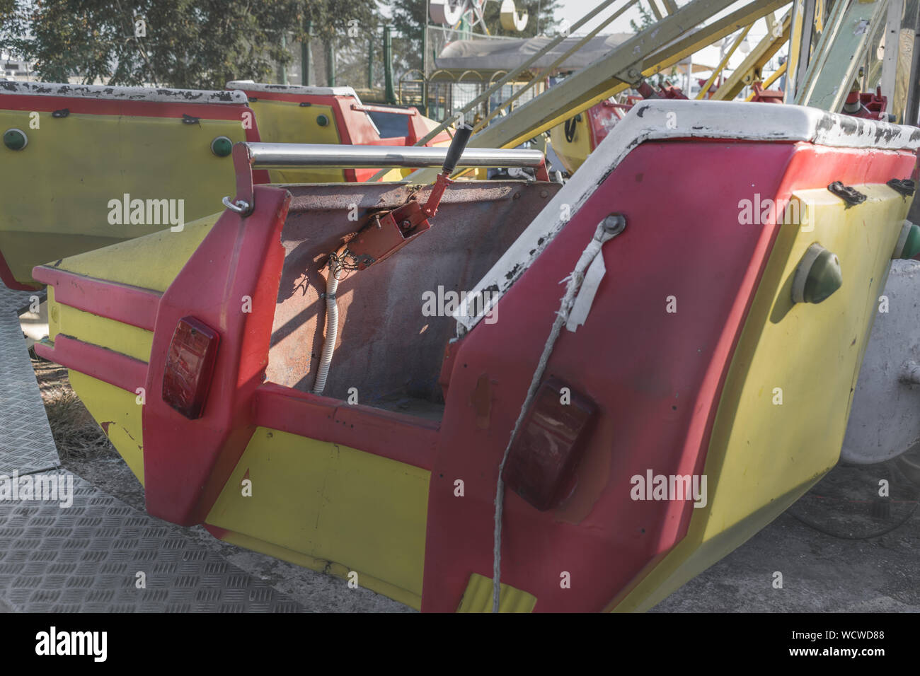 Hurricane ride with cars of an abandoned amusement park "Luna Park" in ...