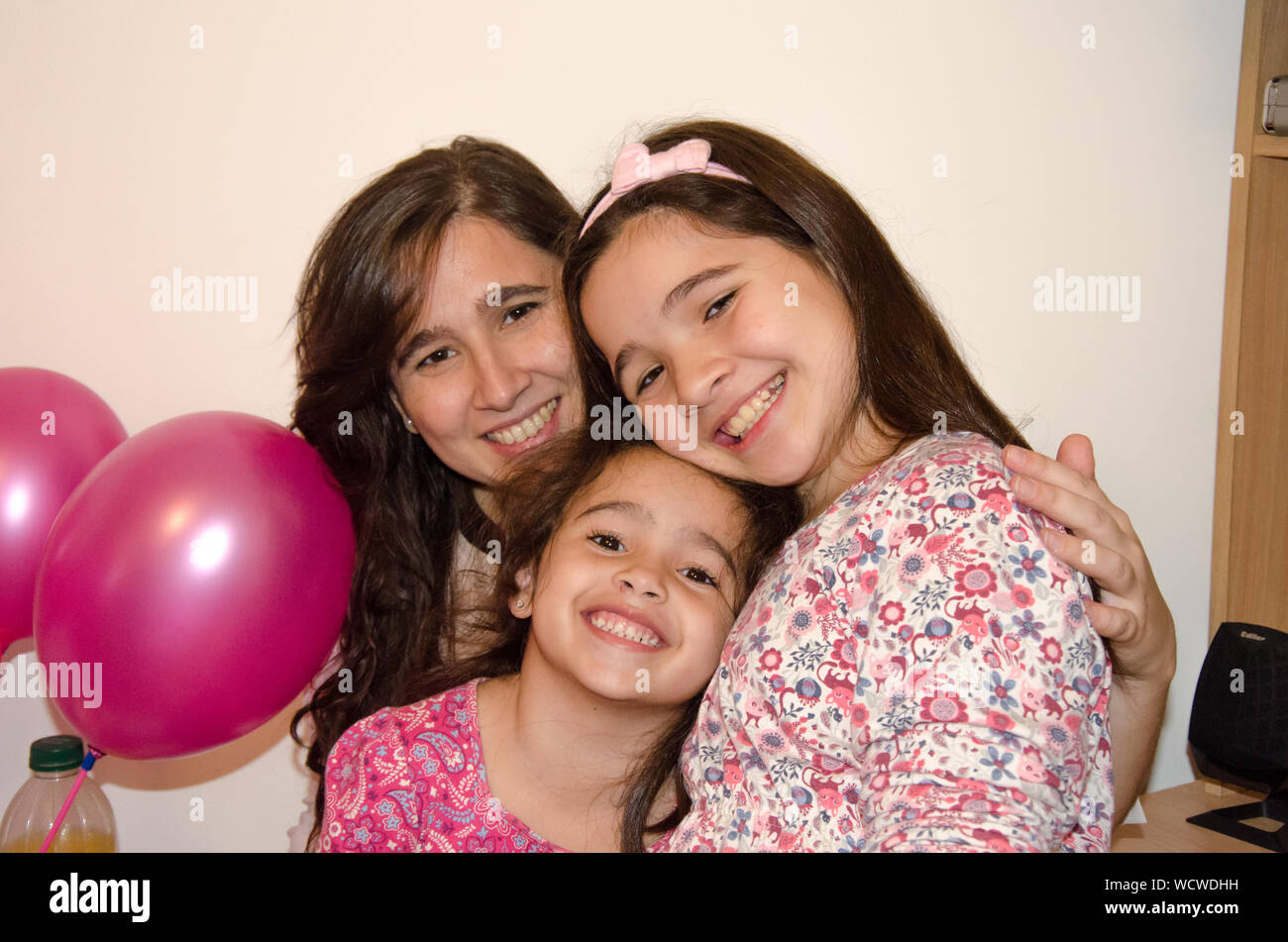 Woman with two daughters hi-res stock photography and images - Alamy
