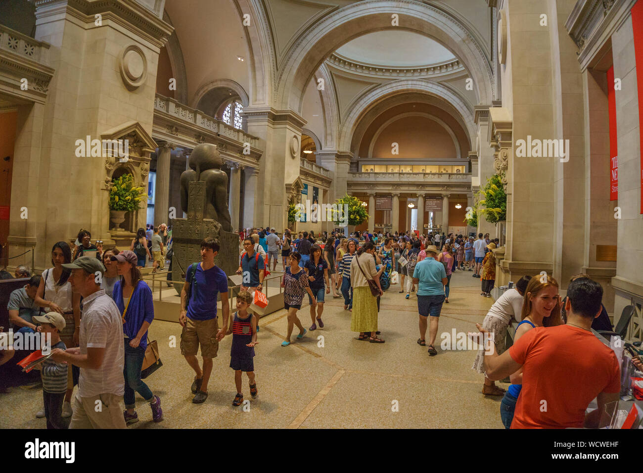 Lot of people and Tourists walk inside the Metropolitan Museum of Art ...