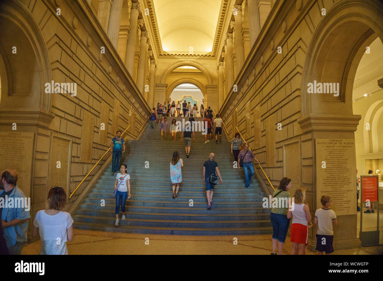 Lot of people and Tourists walk inside the Metropolitan Museum of Art ...