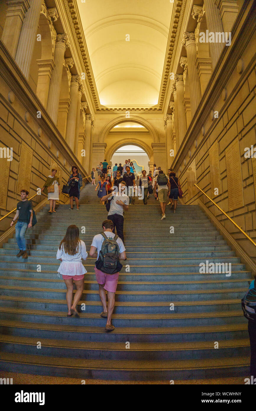 Lot of people and Tourists walk inside the Metropolitan Museum of Art ...